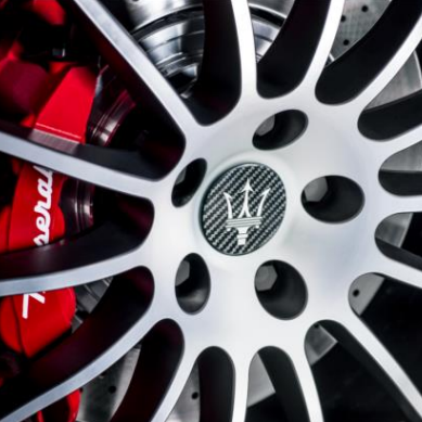 Maserati Carbon Fiber Center Caps (Set of 4) — Miller Motorcars Boutique